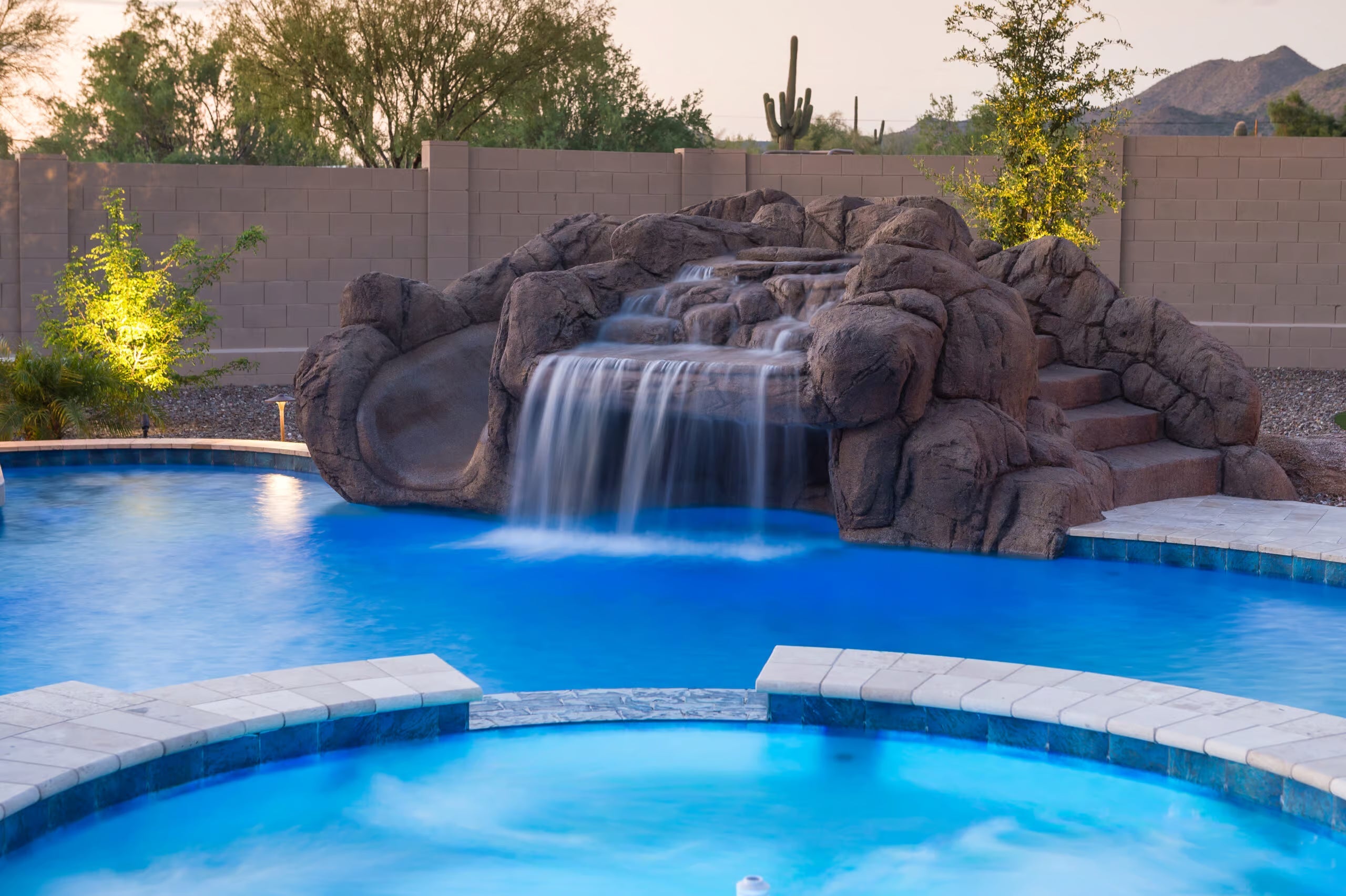 Pool waterfalls for inground pools: nature’s symphony in your garden